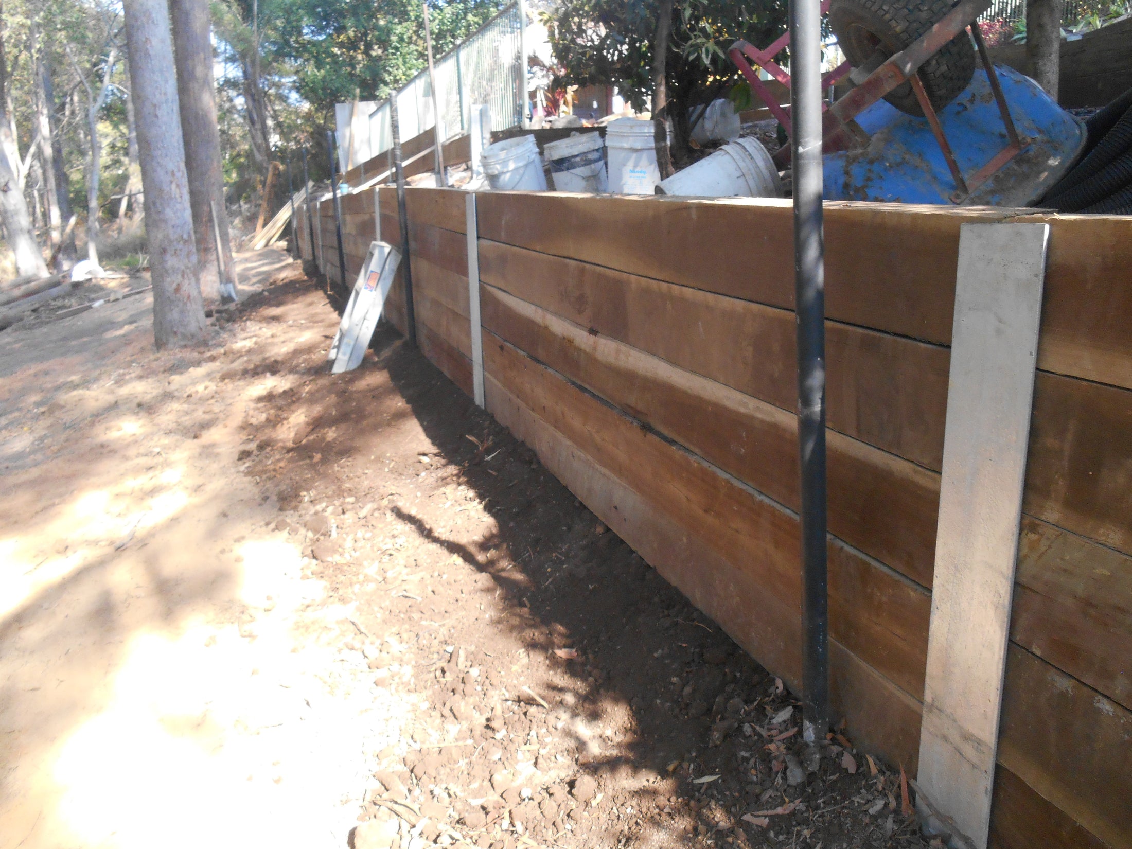 Reliable Treated Hardwood Sleeper Wall for Residential Property in Rob ...