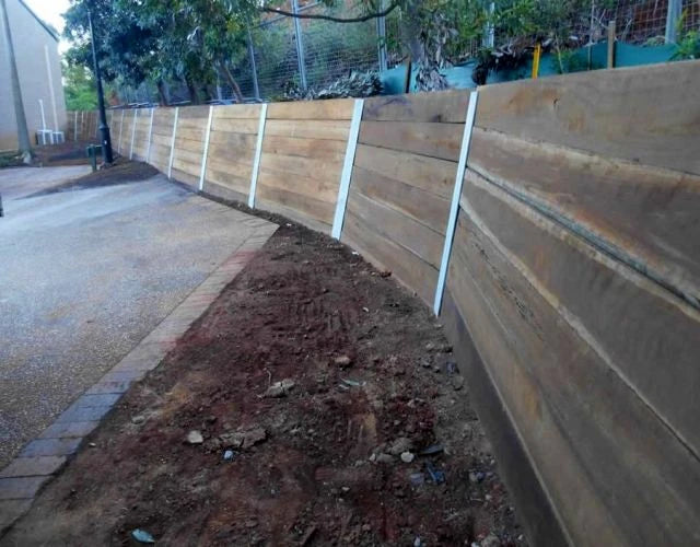 Sleeper and Log Retaining Wall Builders - Pine Log - H4 hardwood ...