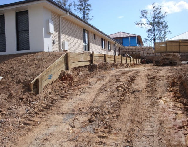 Space-Efficient Concrete Sleeper Retaining Wall at Augustine Heights ...