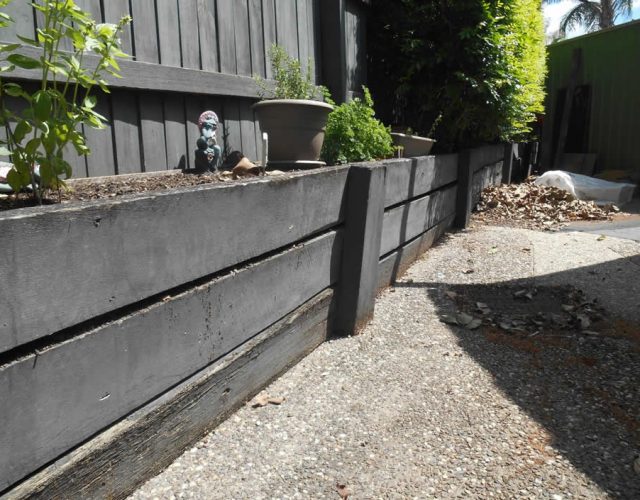 Hand Placed Sandstone Rock Wall Installation in Carrara – Gold Coast ...