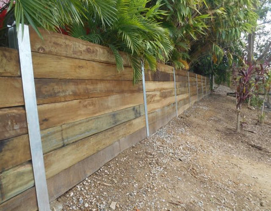 Sleeper and Log Retaining Wall Builders - Pine Log - H4 hardwood ...